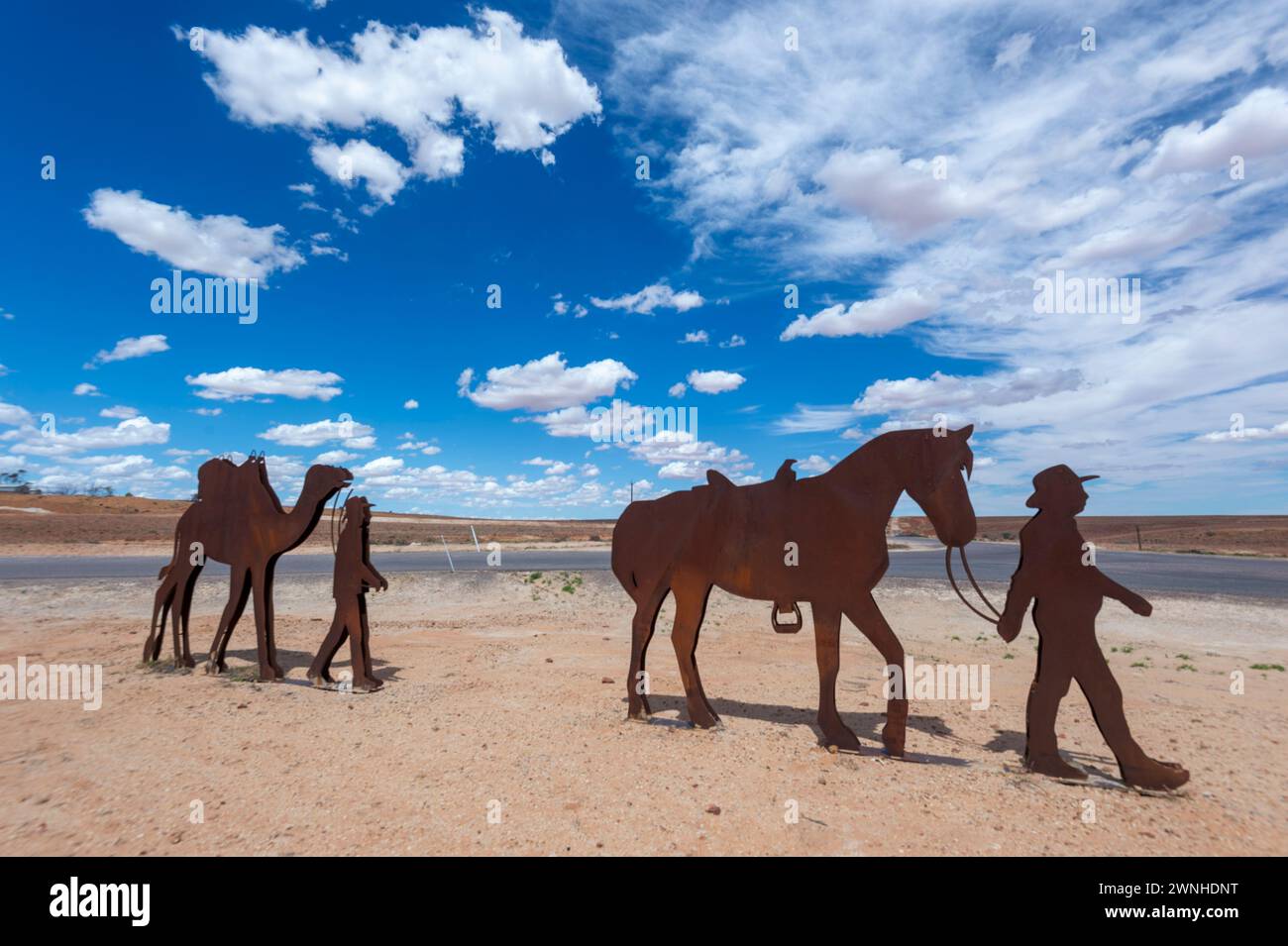 Metal statue of early explorers with camel and horse, Innamincka, South ...