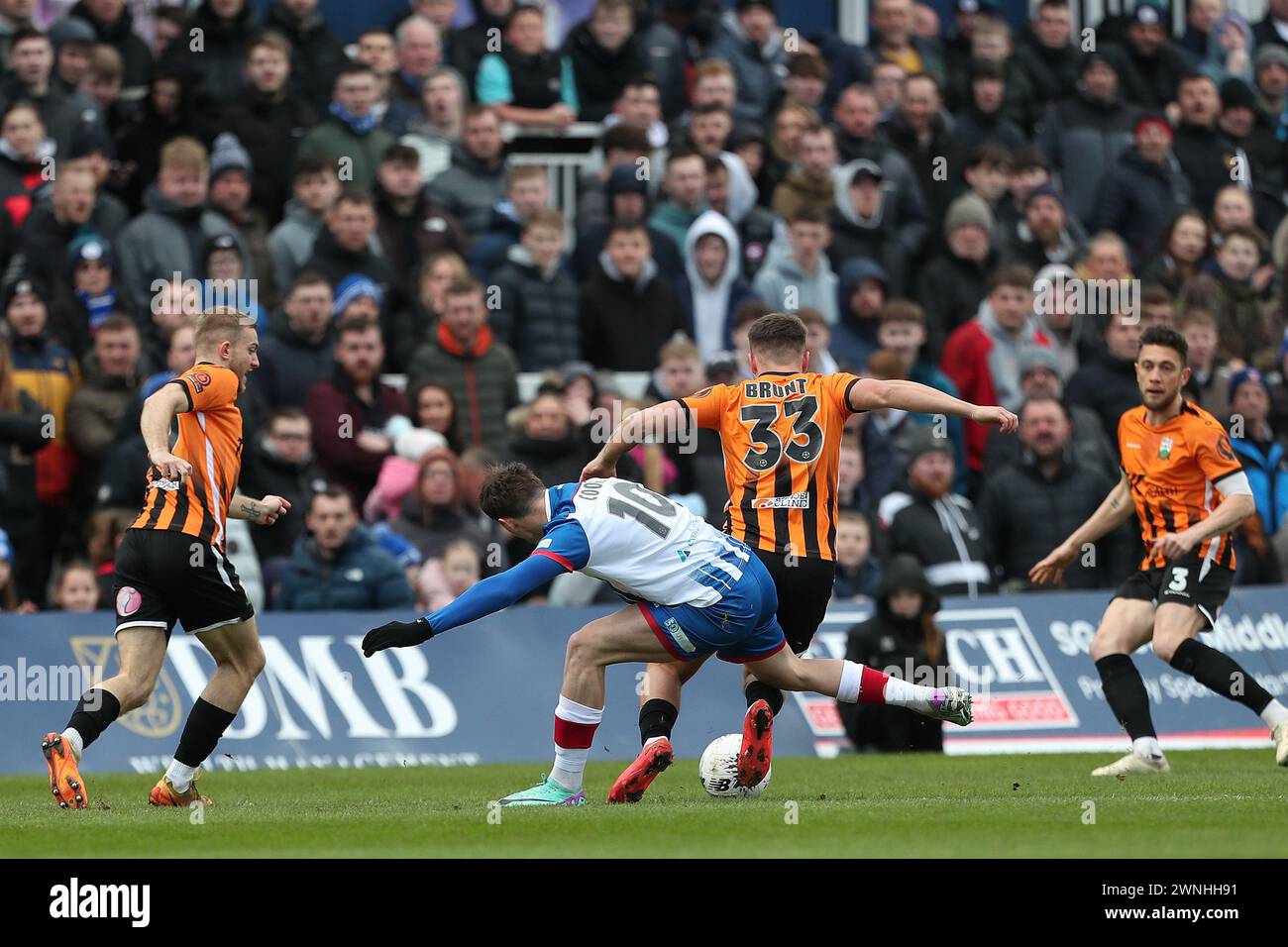 Callum Cooke of Hartlepool United battles with Barnet's Zak Brunt ...