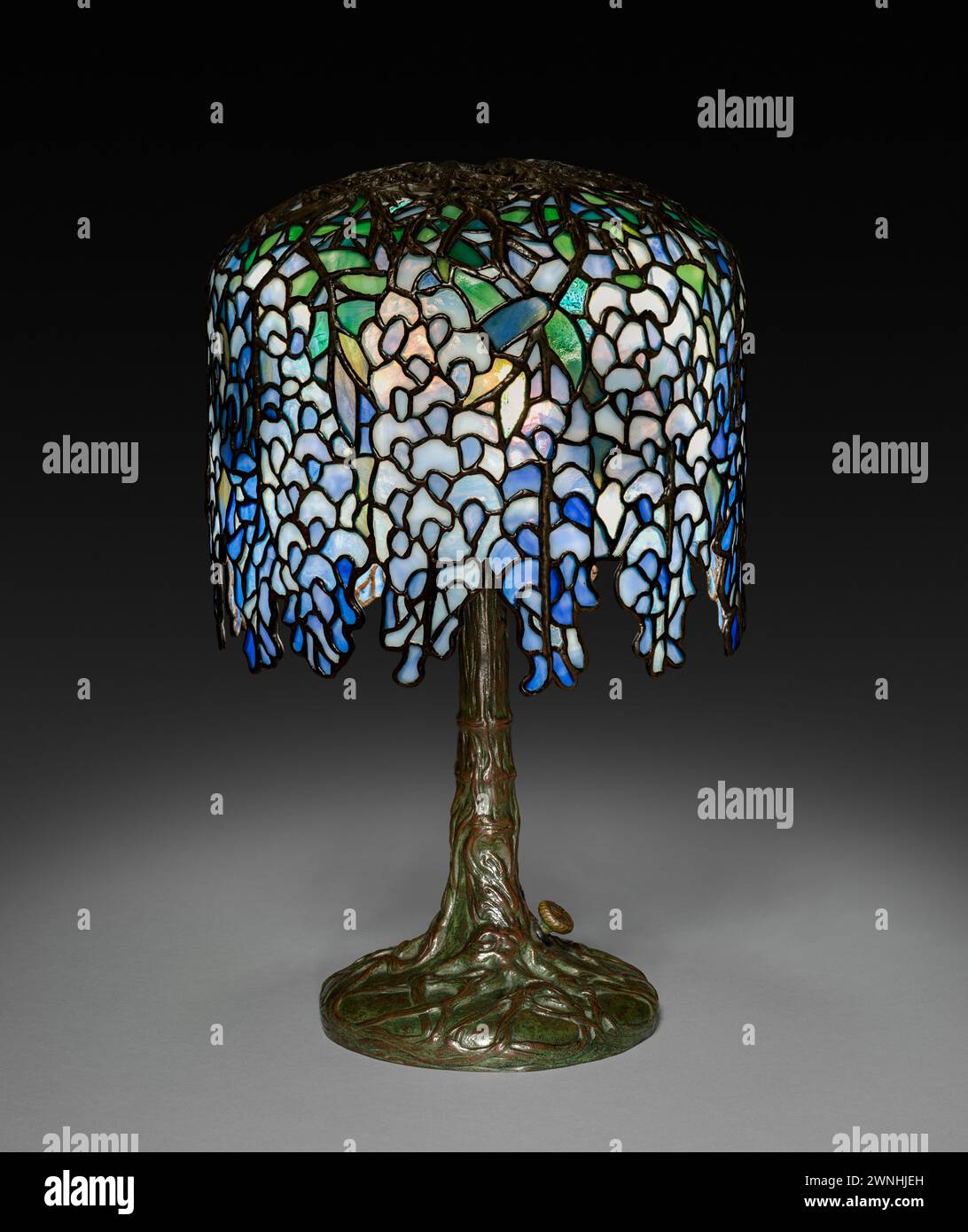 Vintage Tiffany Studios Lamp. "Pony" Wisteria Lamp, designed by Clara ...