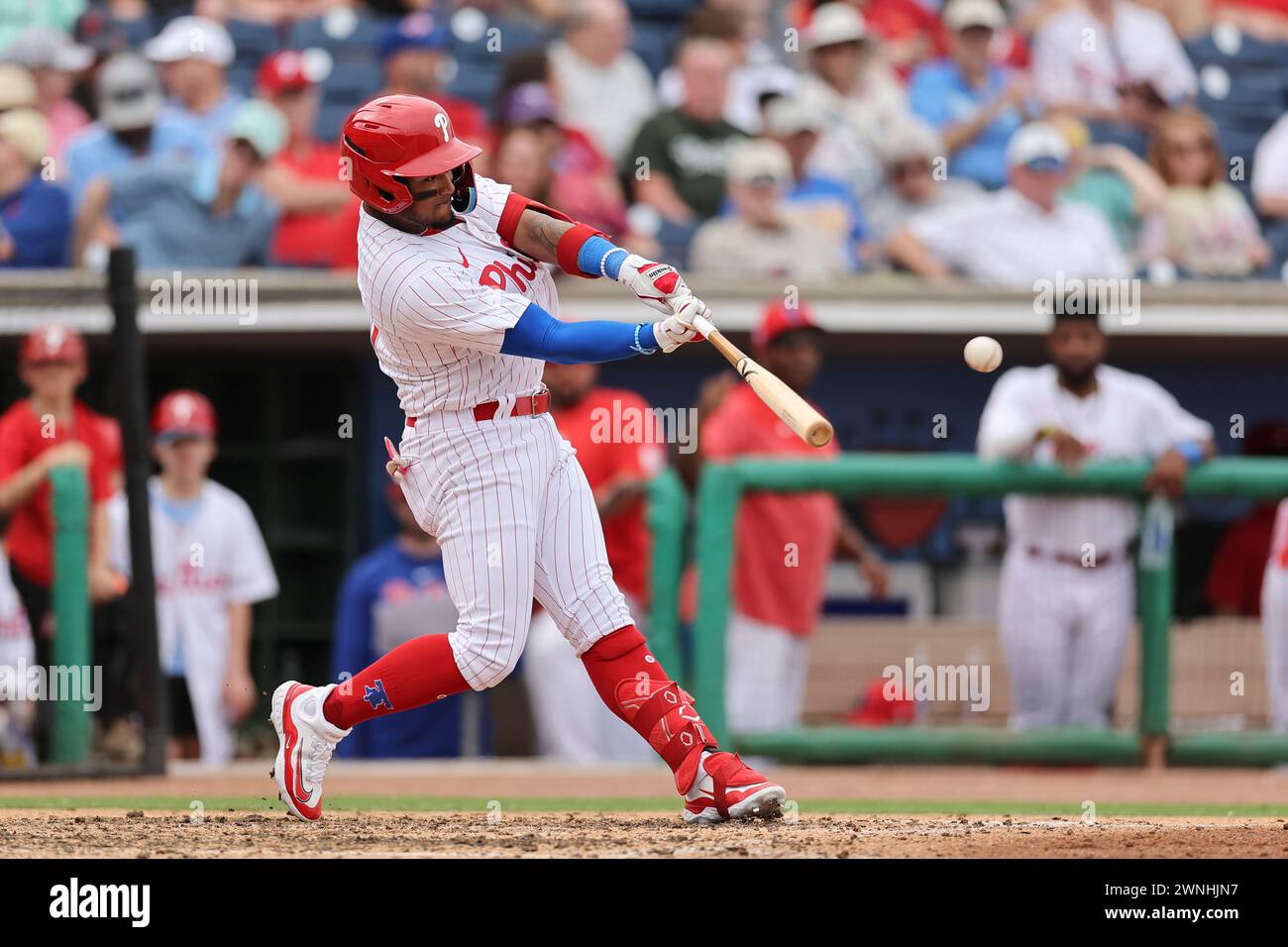 Clearwater, Florida, USA. 2nd Mar, 2024. Philadelphia Phillies shortstop Erick Brito (9) doubles ...