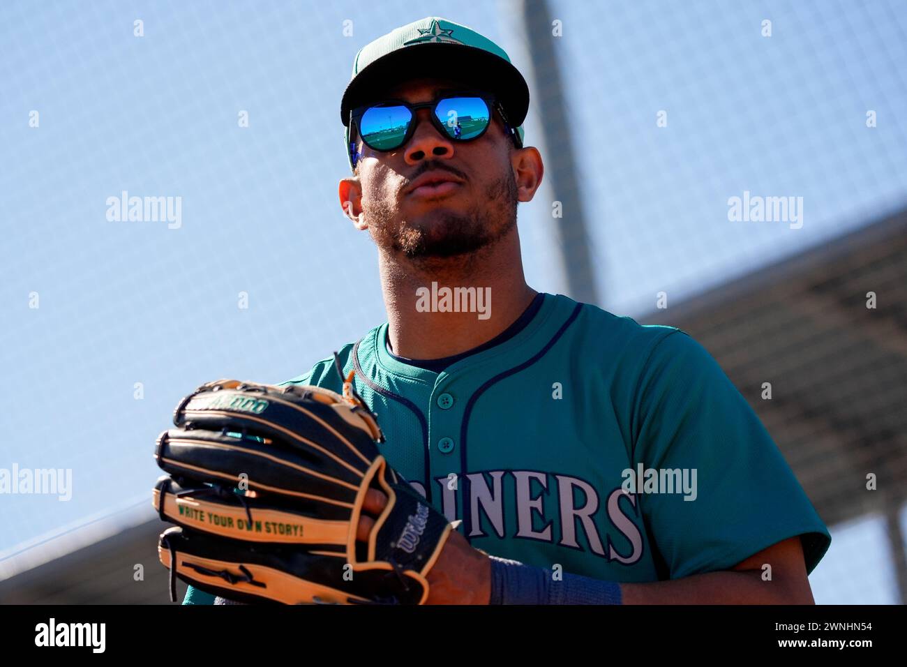 Seattle Mariners center fielder Julio Rodríguez walks out of the dugout ...