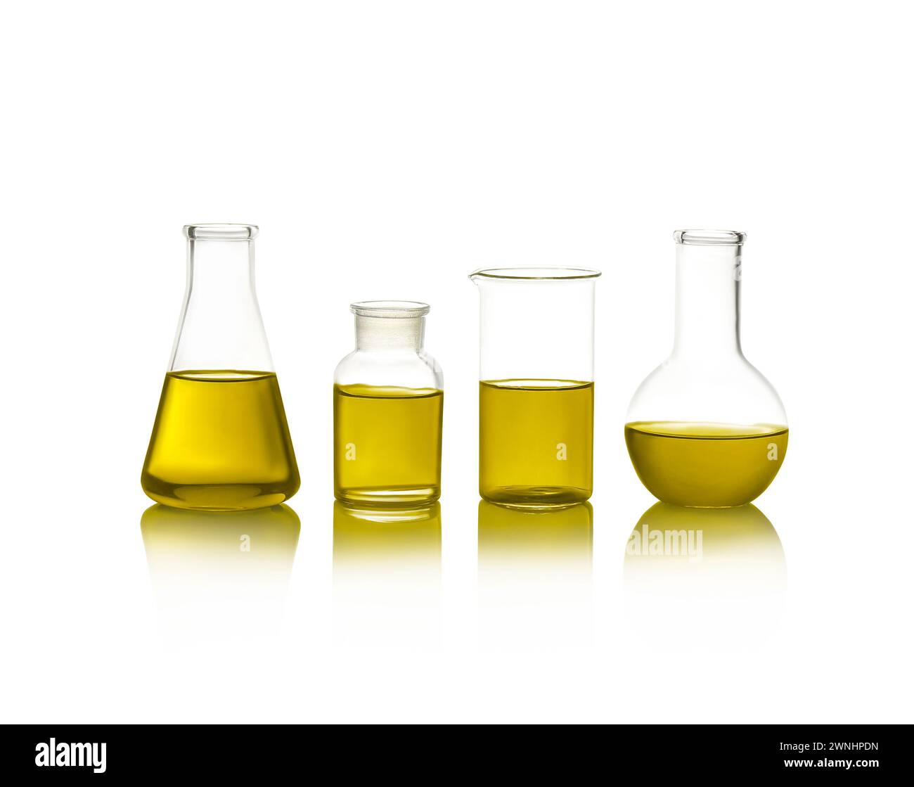 Laboratory glassware with yellow liquid isolated on white Stock Photo ...