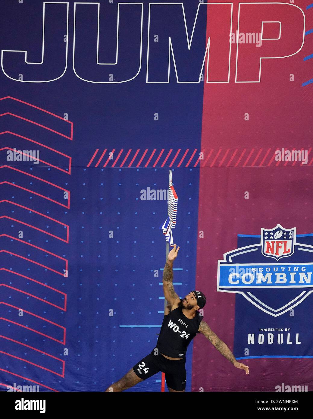 Washington wide receiver Ja'Lynn Polk participates in the vertical jump ...