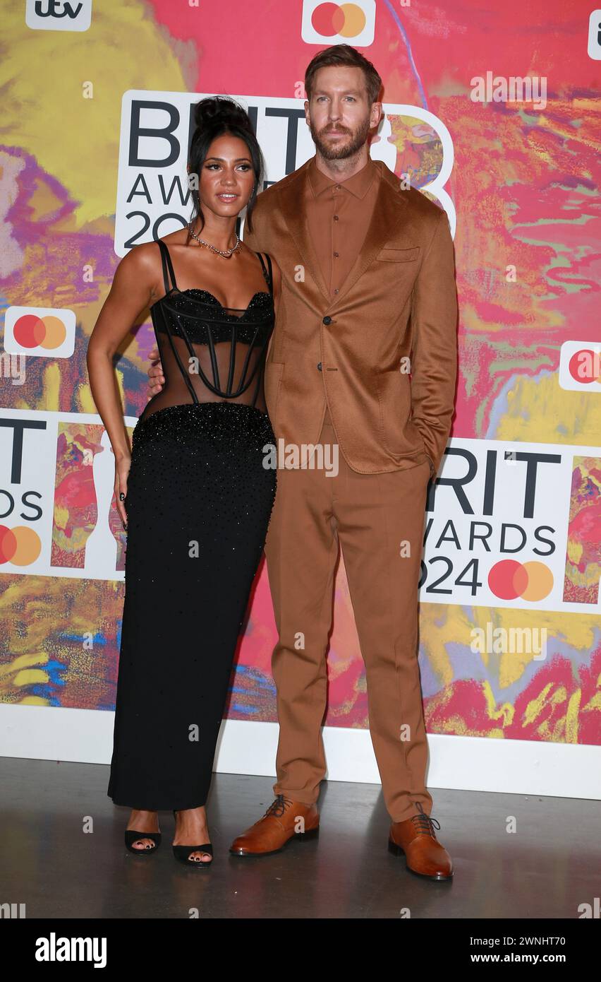 London, UK. 02nd Mar, 2024. Vick Hope and Calvin Harris attend the BRIT ...