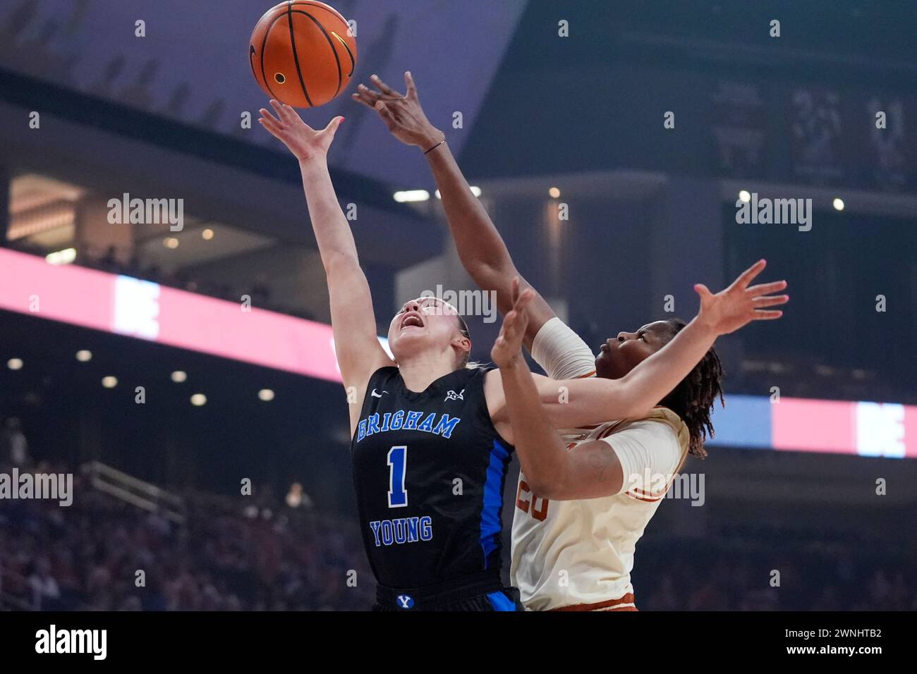 BYU guard Amari Whiting (1) has her shot blocked by Texas forward ...
