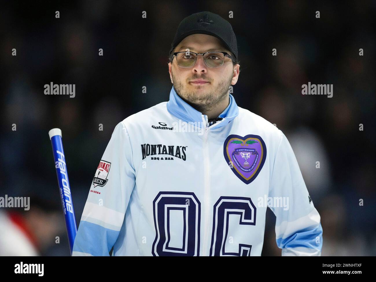 Quebec skip Julien Tremblay watches his shot while playing Nunavut at the Brier curling event ...
