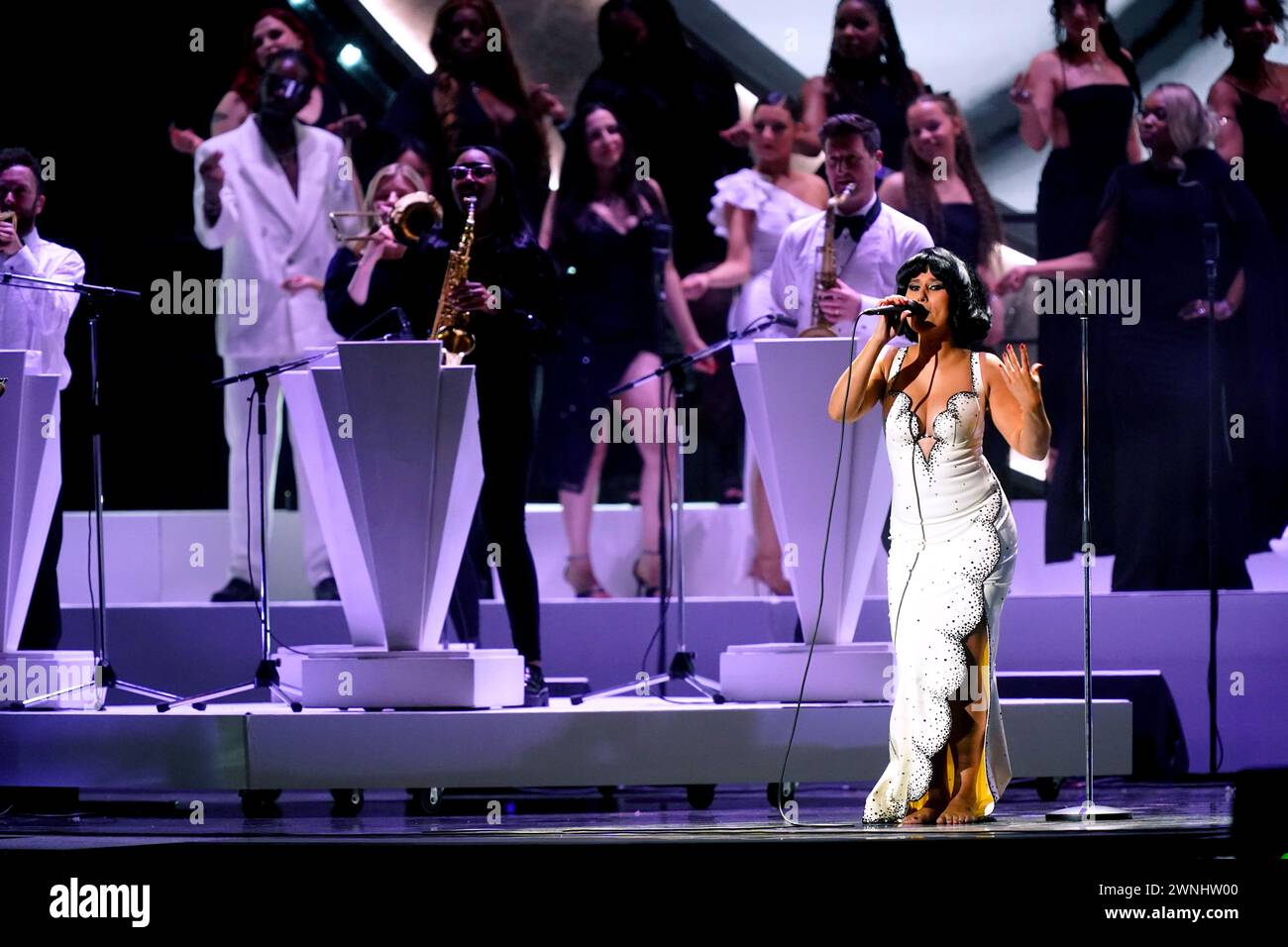 Raye performing on stage during the Brit Awards 2024 at the O2 Arena ...