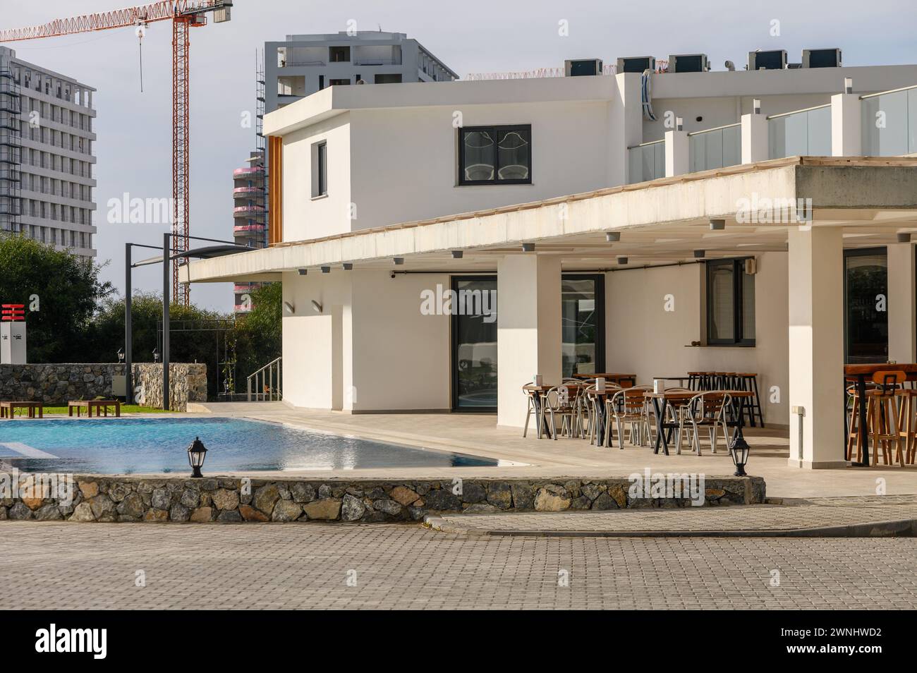 swimming pool near a cafe in a residential complex Stock Photo - Alamy