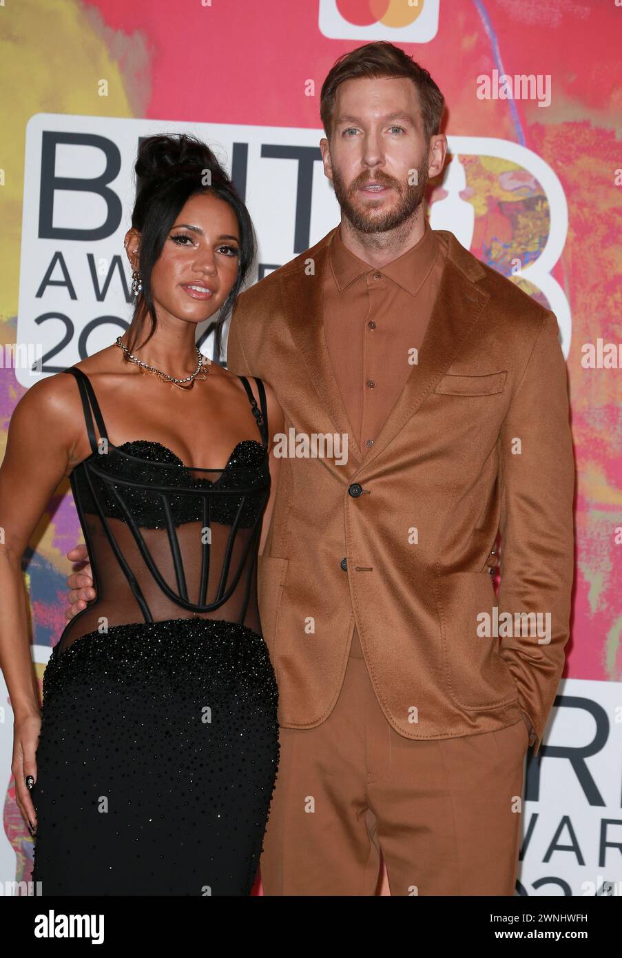 London, UK. 02nd Mar, 2024. Vick Hope and Calvin Harris attend the BRIT ...