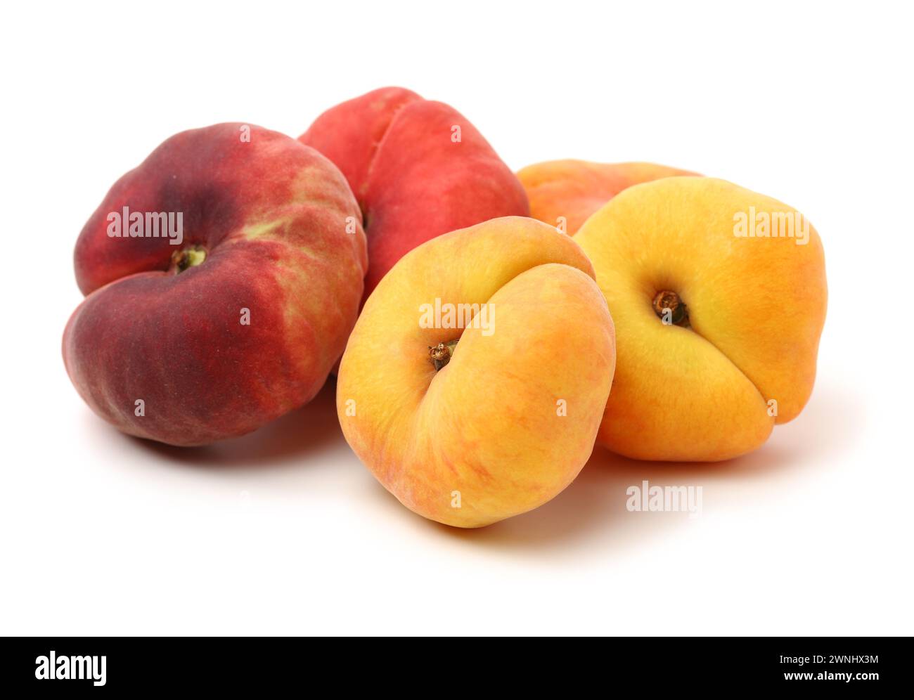 chinese flat peaches on white background Stock Photo - Alamy