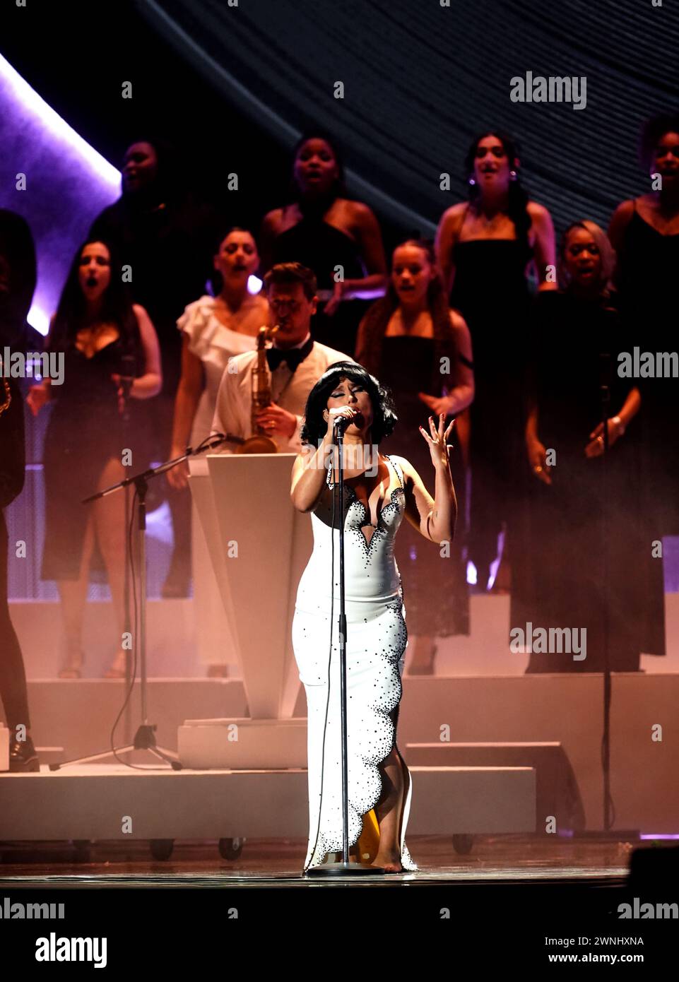 Raye performing on stage during the Brit Awards 2024 at the O2 Arena ...