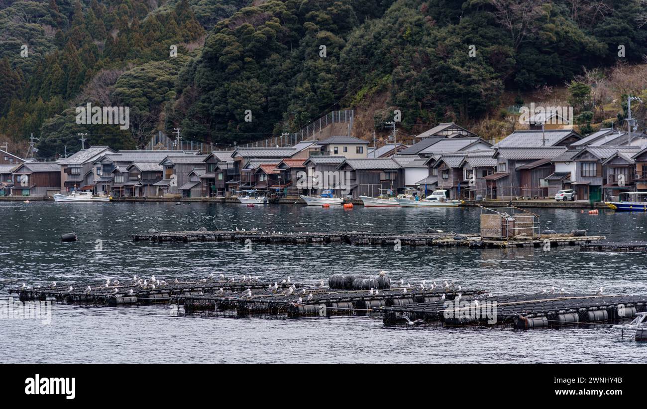 Traditional wooden fishermen Funaya boathouses in Ine north Kyoto ...