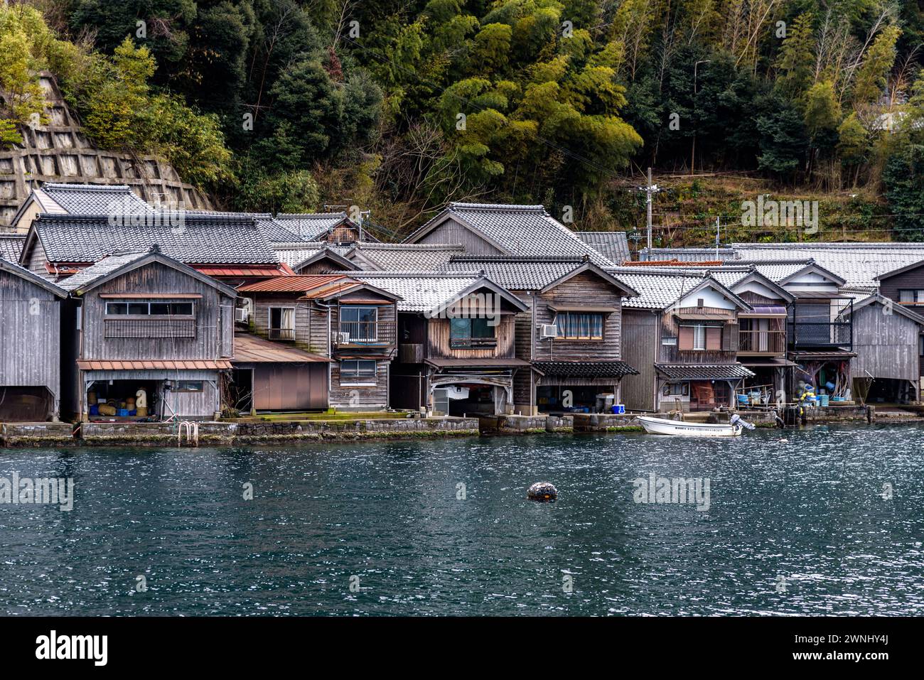 Traditional wooden fishermen Funaya boathouses in Ine north Kyoto ...