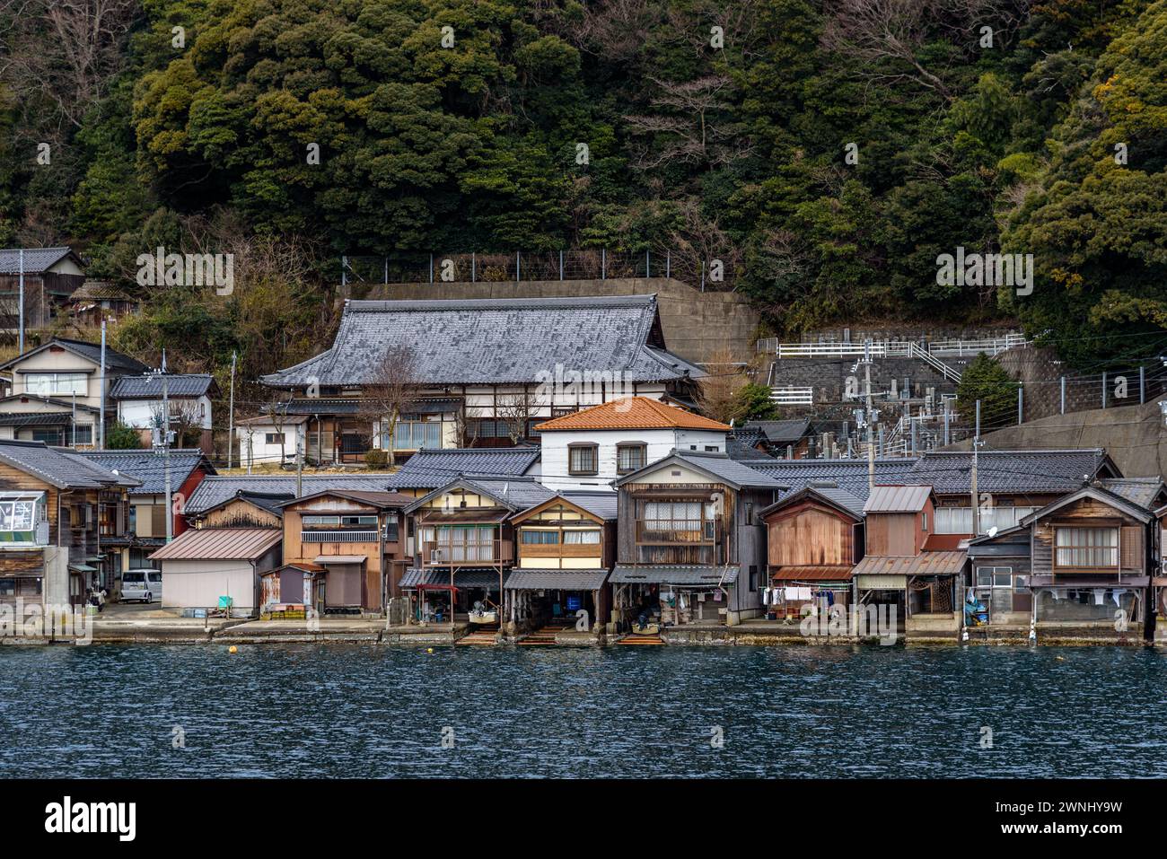 Traditional wooden fishermen Funaya boathouses in Ine north Kyoto ...