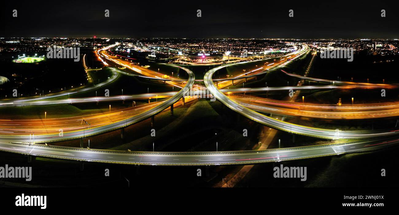 Aerial night view of a cloverleaf interchange highway, The Haque, The ...