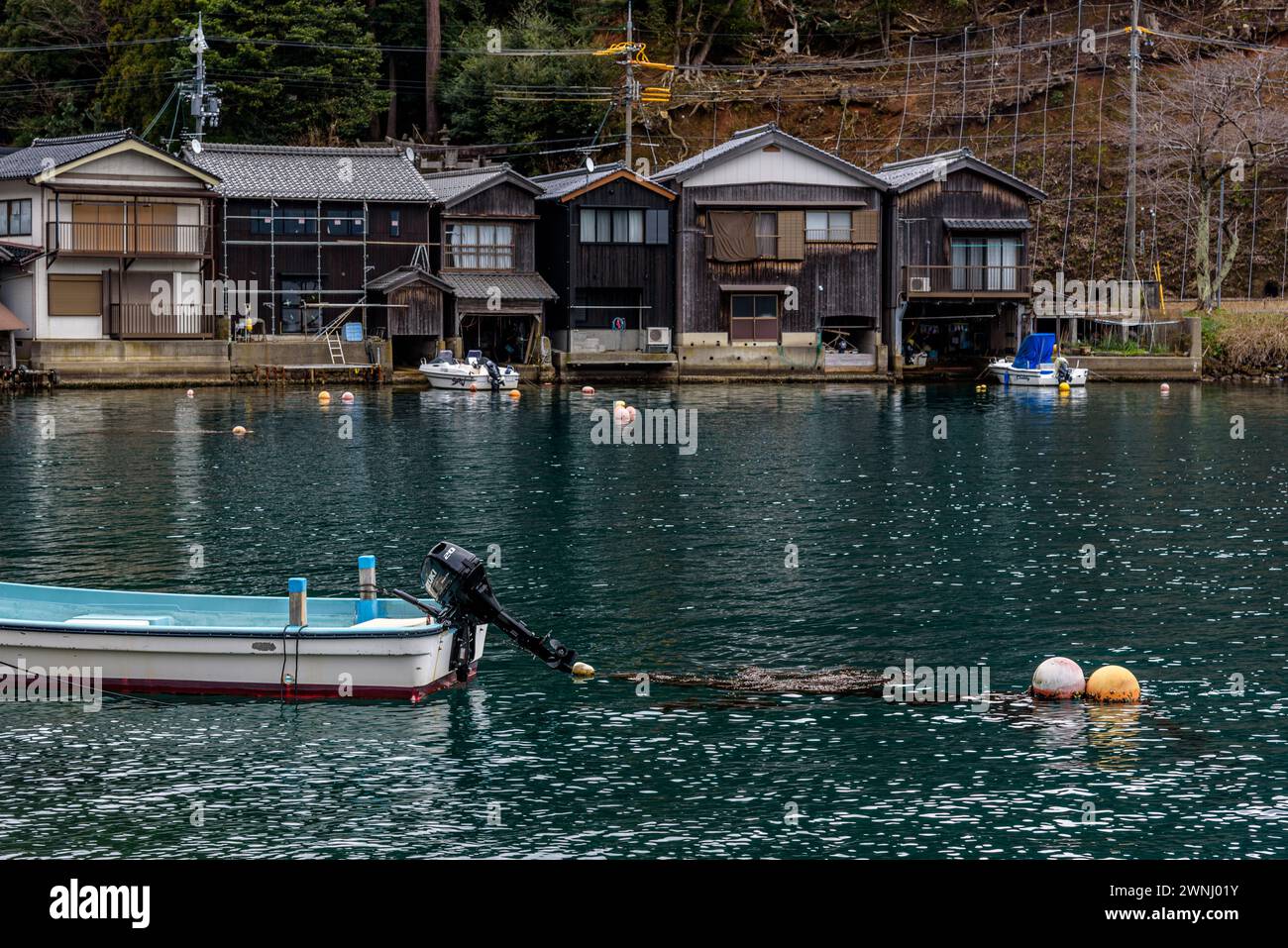 Traditional wooden fishermen Funaya boathouses in Ine north Kyoto ...