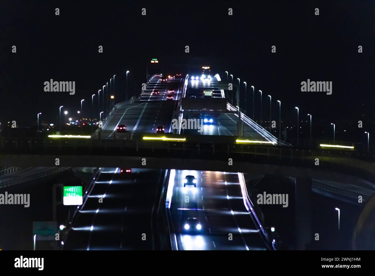 A night traffic jam on the highway at Tokyo bay area telephoto shot ...