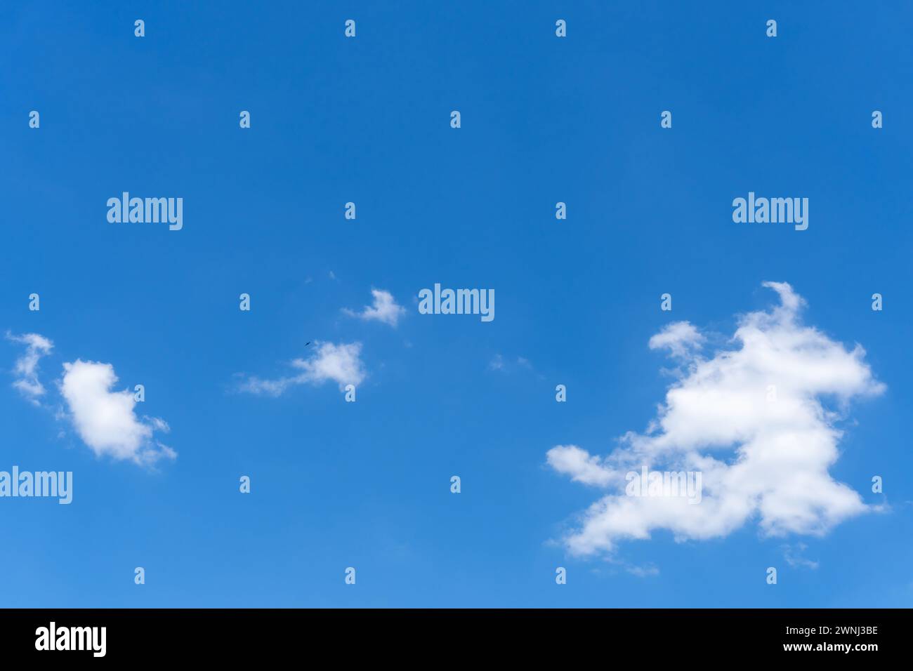 Beautiful blue sky with strange shape of clouds in the morning or ...
