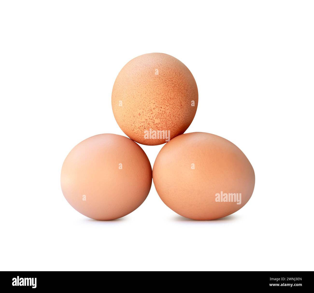 Front view of three fresh chicken eggs in stack is isolated on white ...