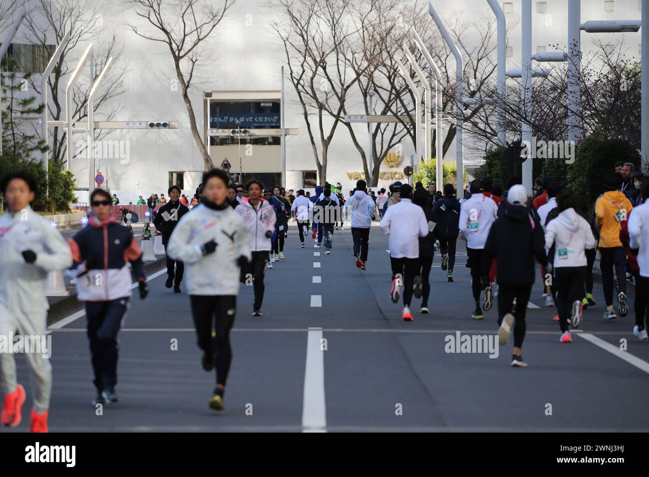 Runners warm up before Tokyo Marathon 2024 at Tokyo Metropolitan ...
