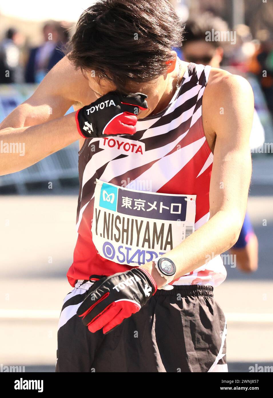 Tokyo, Japan. 3rd Mar, 2024. Japan's Yusuke Nishiyama holds back his ...