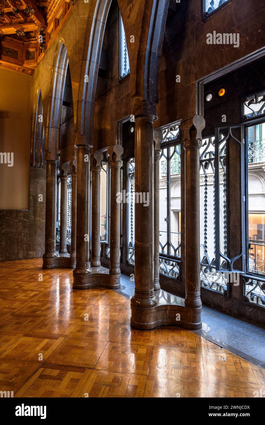 Windows and columns with parabolic arches on the main floor of Palau ...