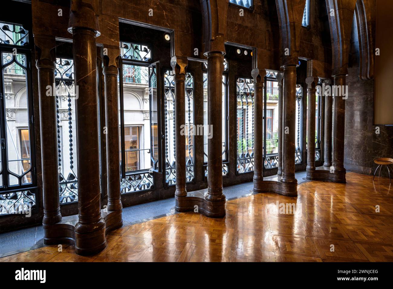 Windows and columns with parabolic arches on the main floor of Palau ...