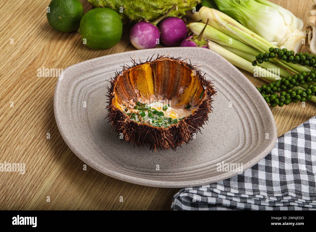 Delicous Grilled Sea Urchin with egg Stock Photo - Alamy