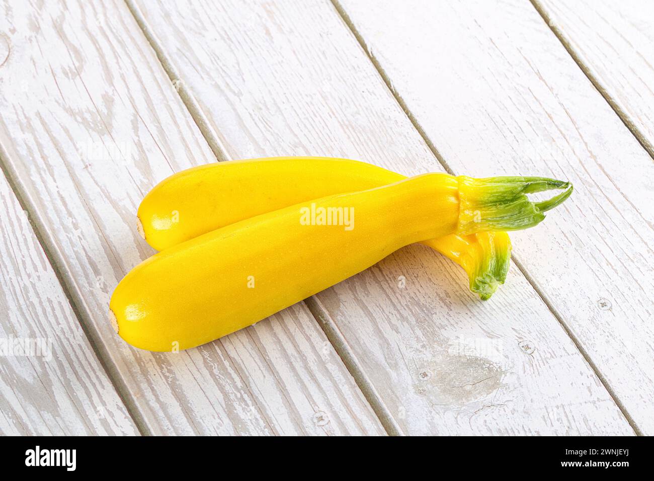 Two Yellow young zucchini for cooking Stock Photo - Alamy