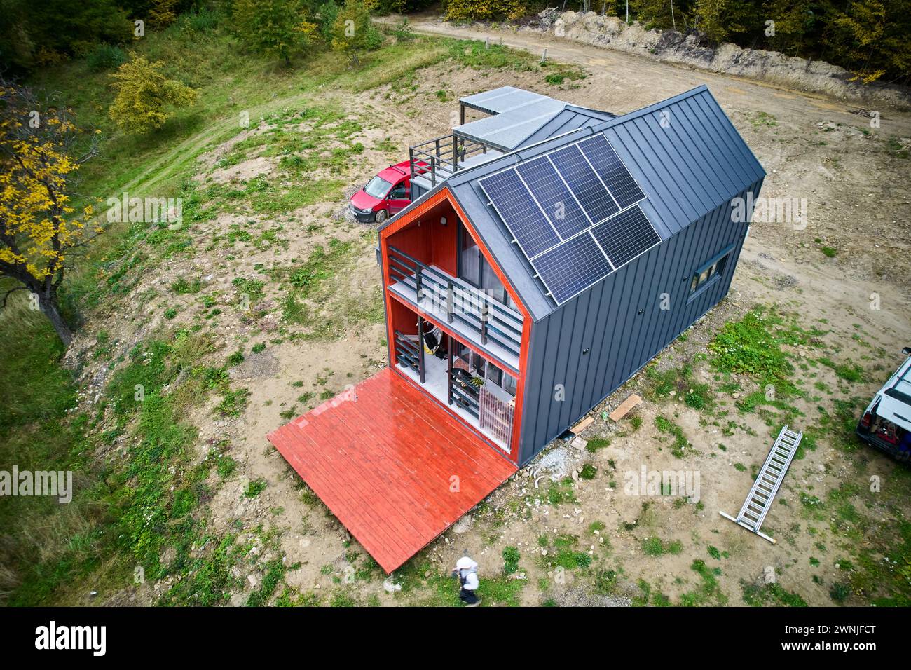 New modern house cottage with solar photovoltaic panel system on roof ...