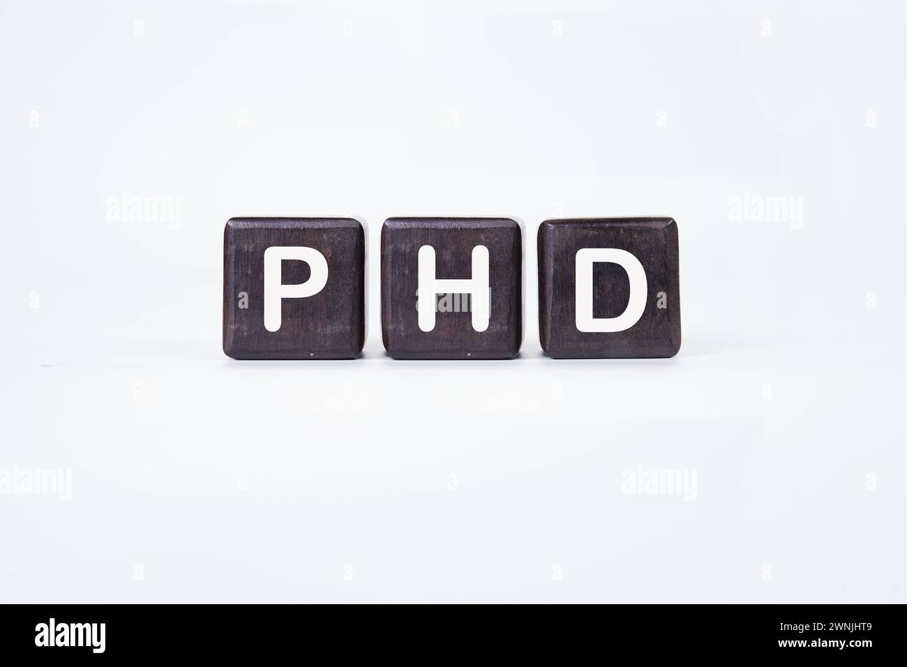 PHD word on cubes on a white background Stock Photo - Alamy