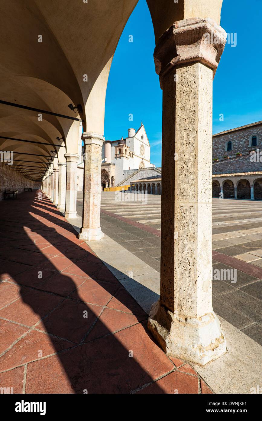 View through columns onto the Basilica of St Francis of Assisi in the ...