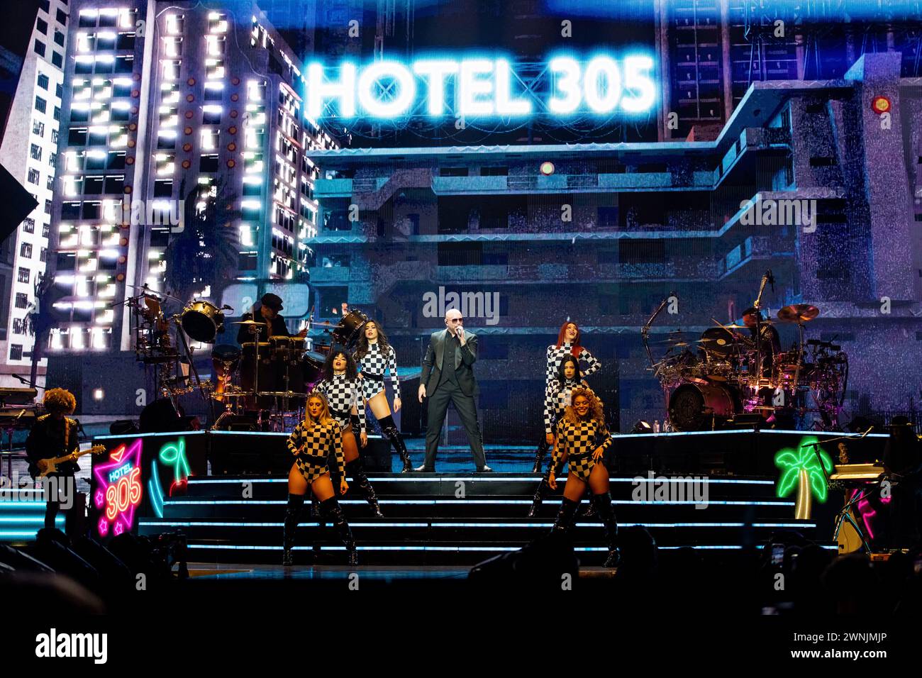 American hip hop and pop artist, Pitbull, performs on stage as part of ...