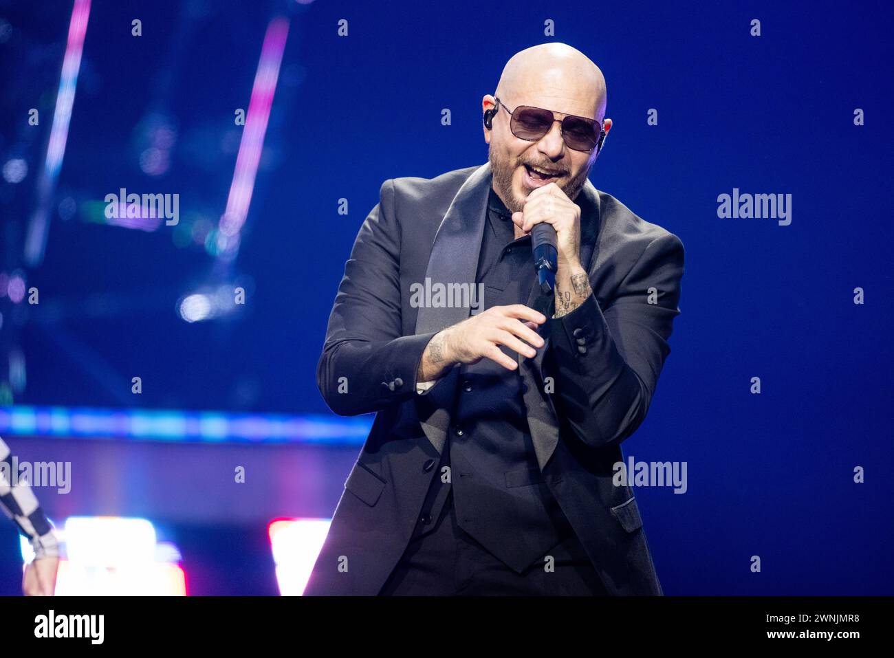 American hip hop and pop artist, Pitbull, performs on stage as part of ...