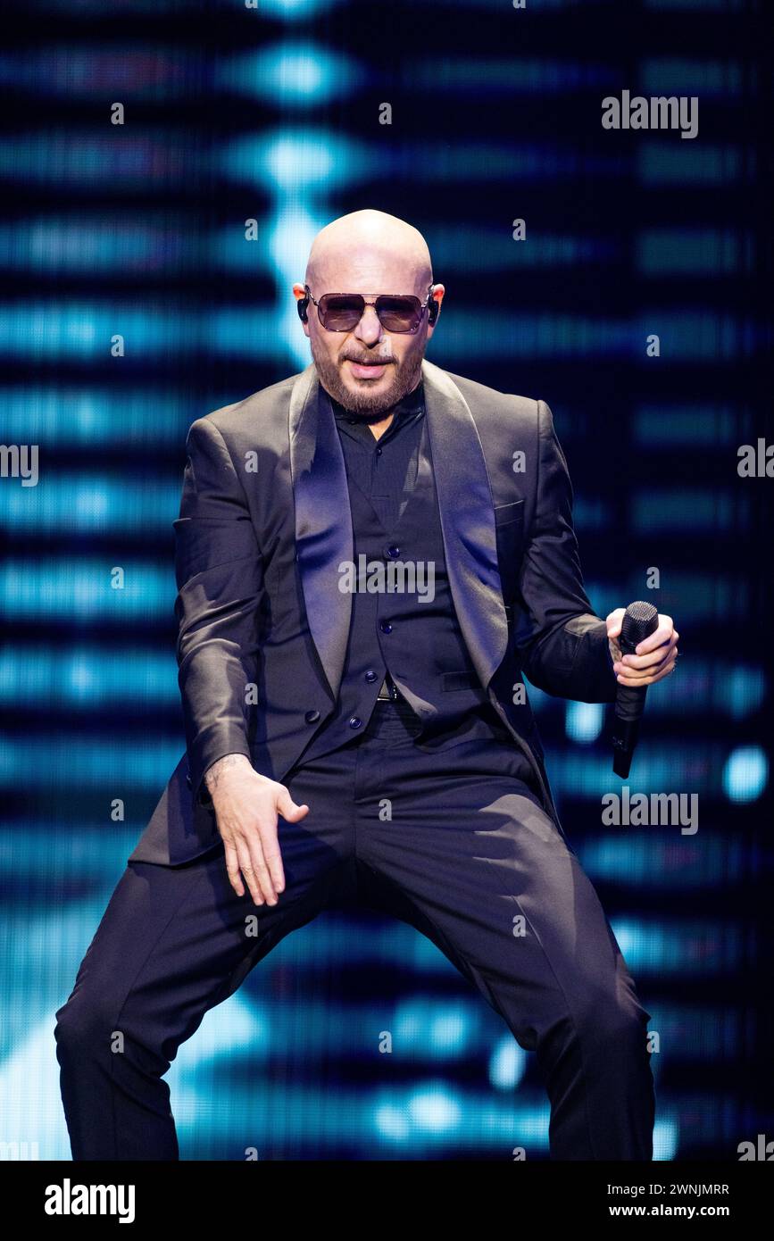 American hip hop and pop artist, Pitbull, performs on stage as part of ...