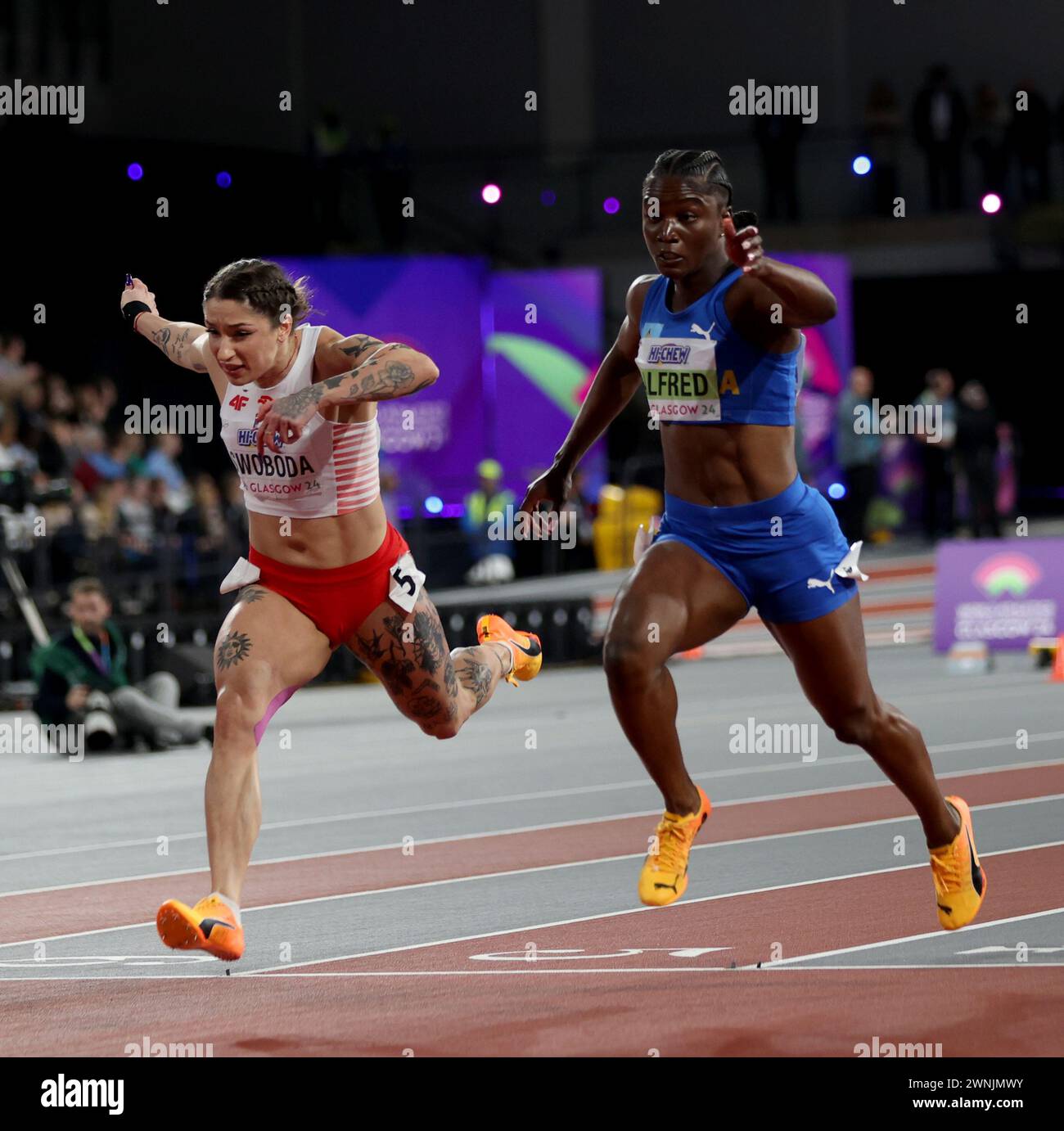 Glasgow, Britain. 2nd Mar, 2024. Julien Alfred (R) of Saint Lucia and Ewa Swoboda of Poland ...