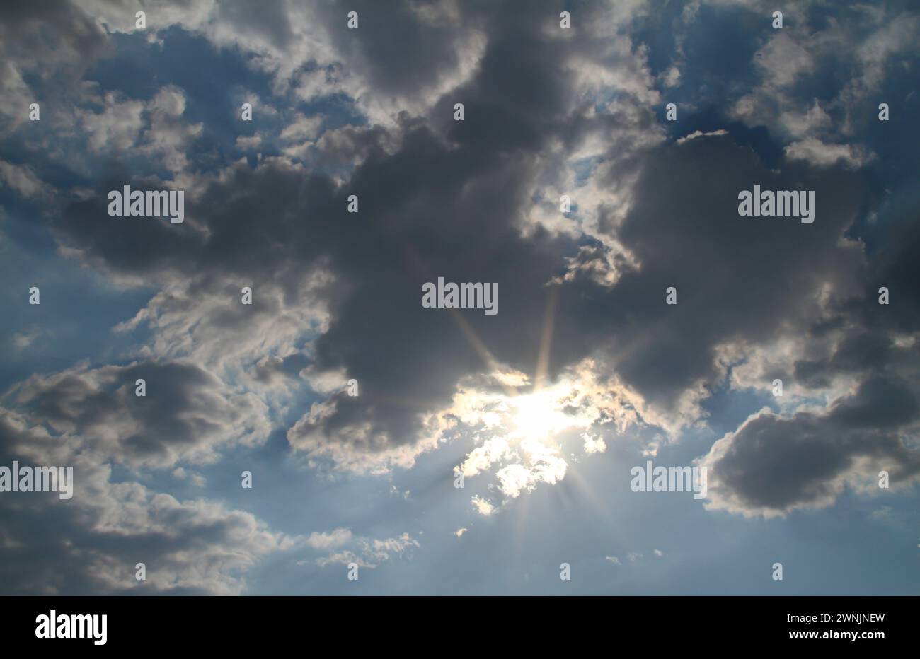 natural clouds blue sky sun ray light Stock Photo - Alamy