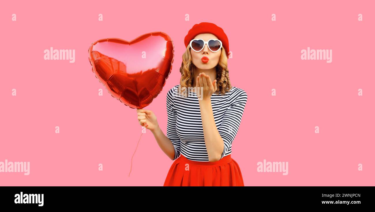 Sweet portrait of beautiful happy young woman with red heart shaped ...