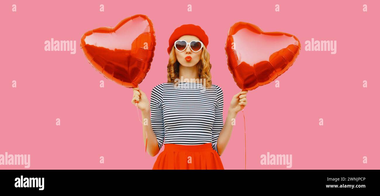 Sweet portrait of beautiful happy young woman with red heart shaped ...