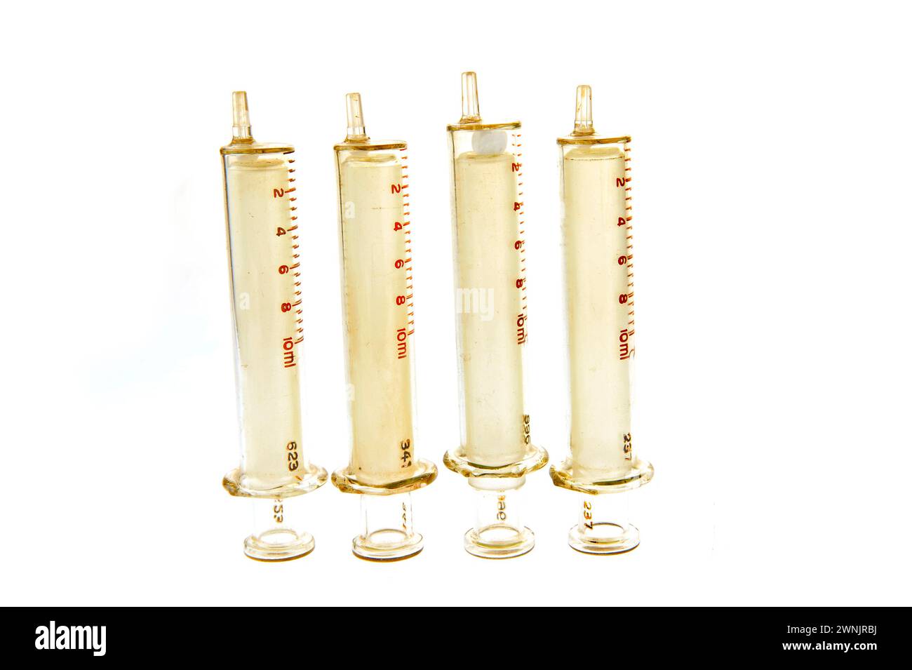 Plastic syringe isolated on white background Stock Photo - Alamy