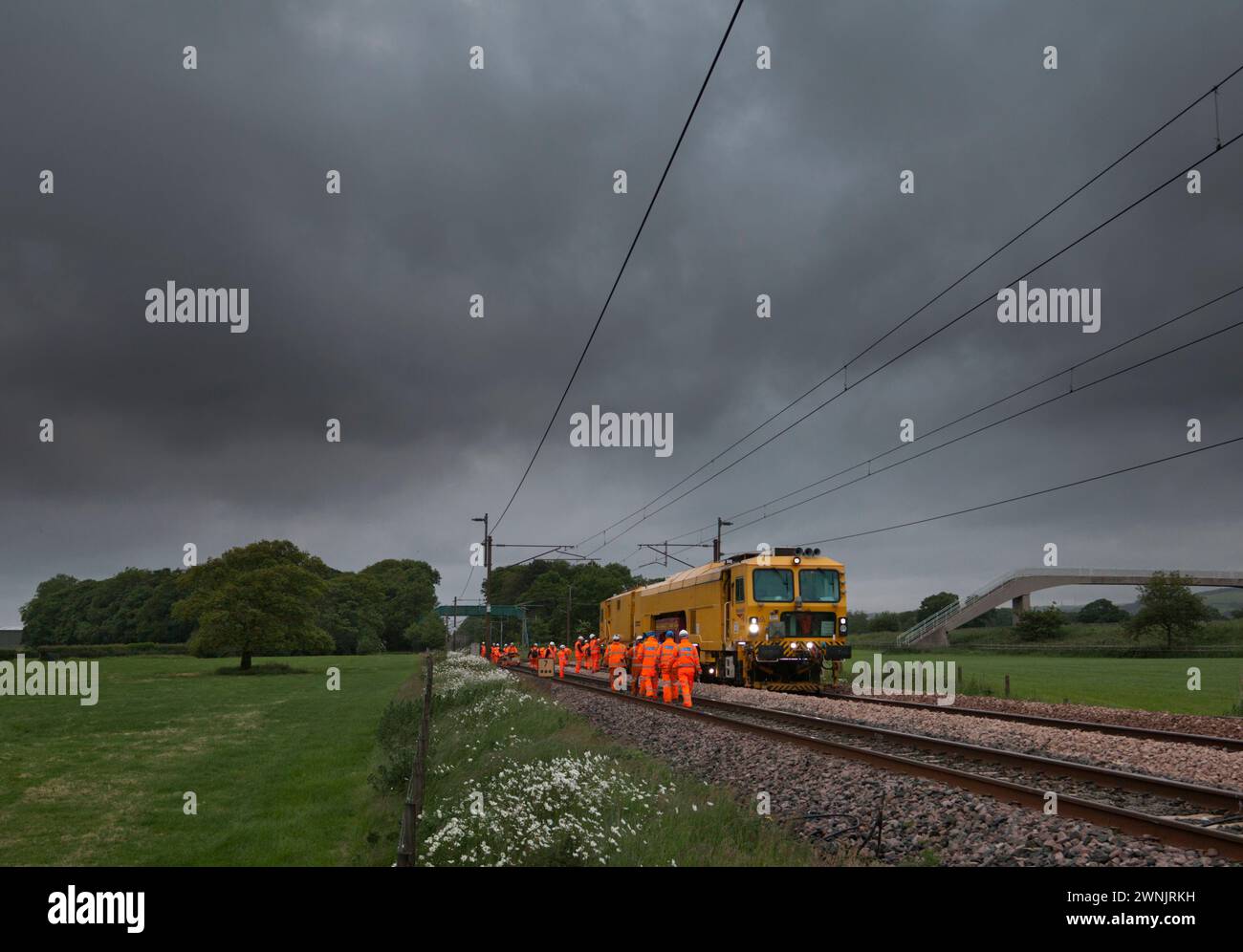 Tamping machine with railway contractors for Network Rail packing ...