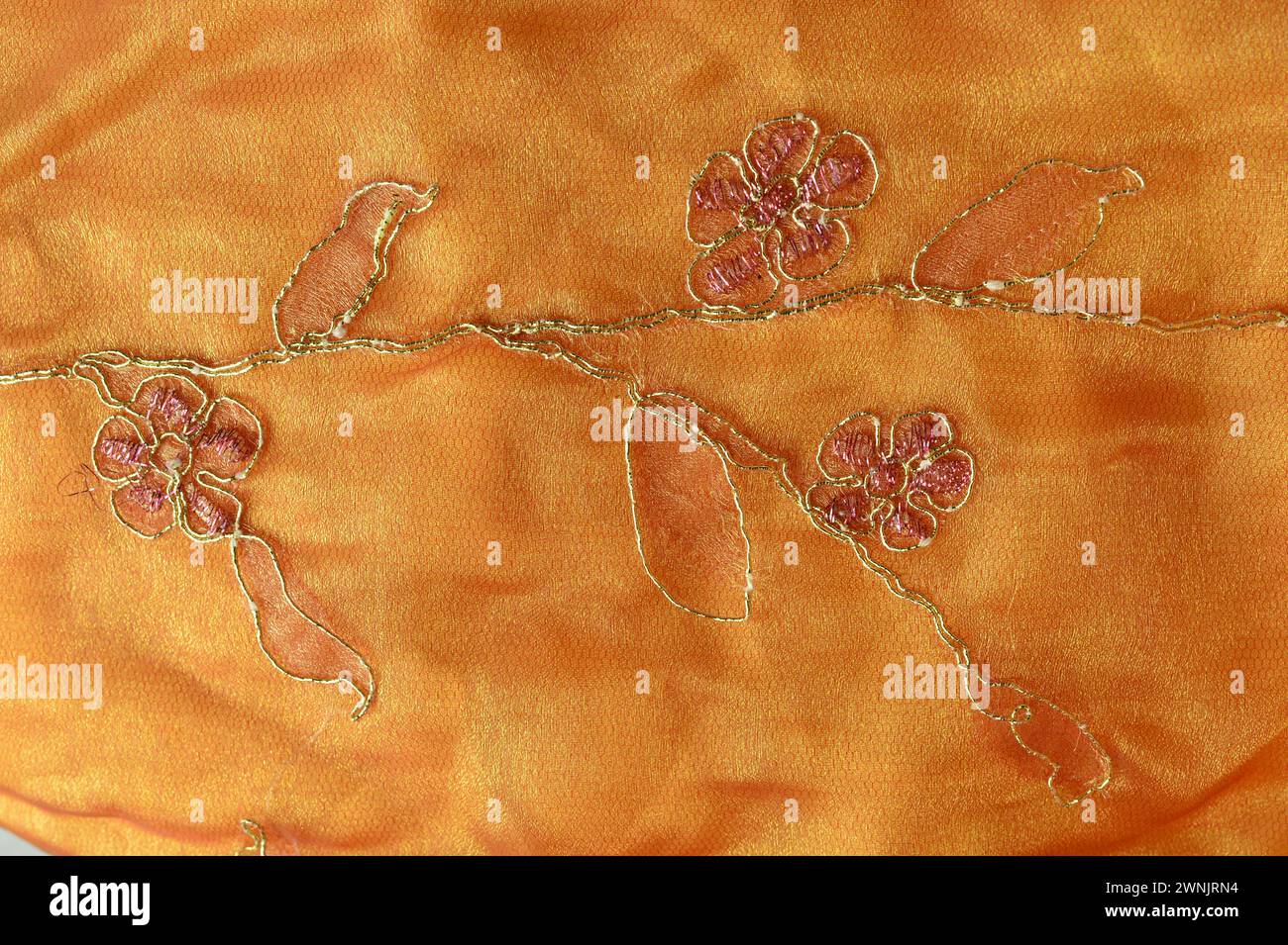 The yellow textile embroidery wedding background Stock Photo - Alamy