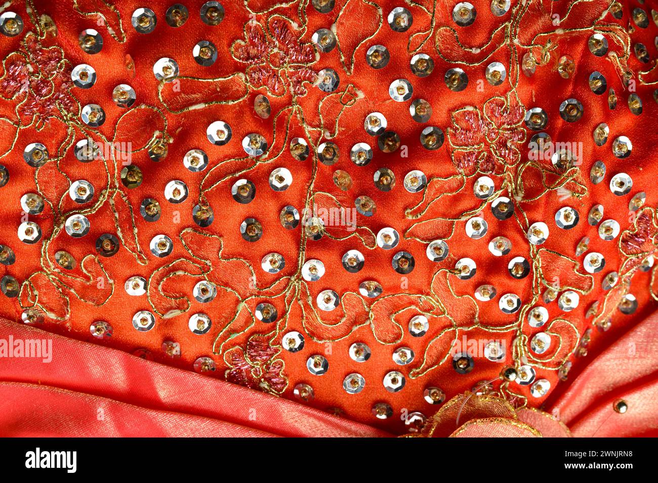 Red textile embroidery wedding background Stock Photo - Alamy