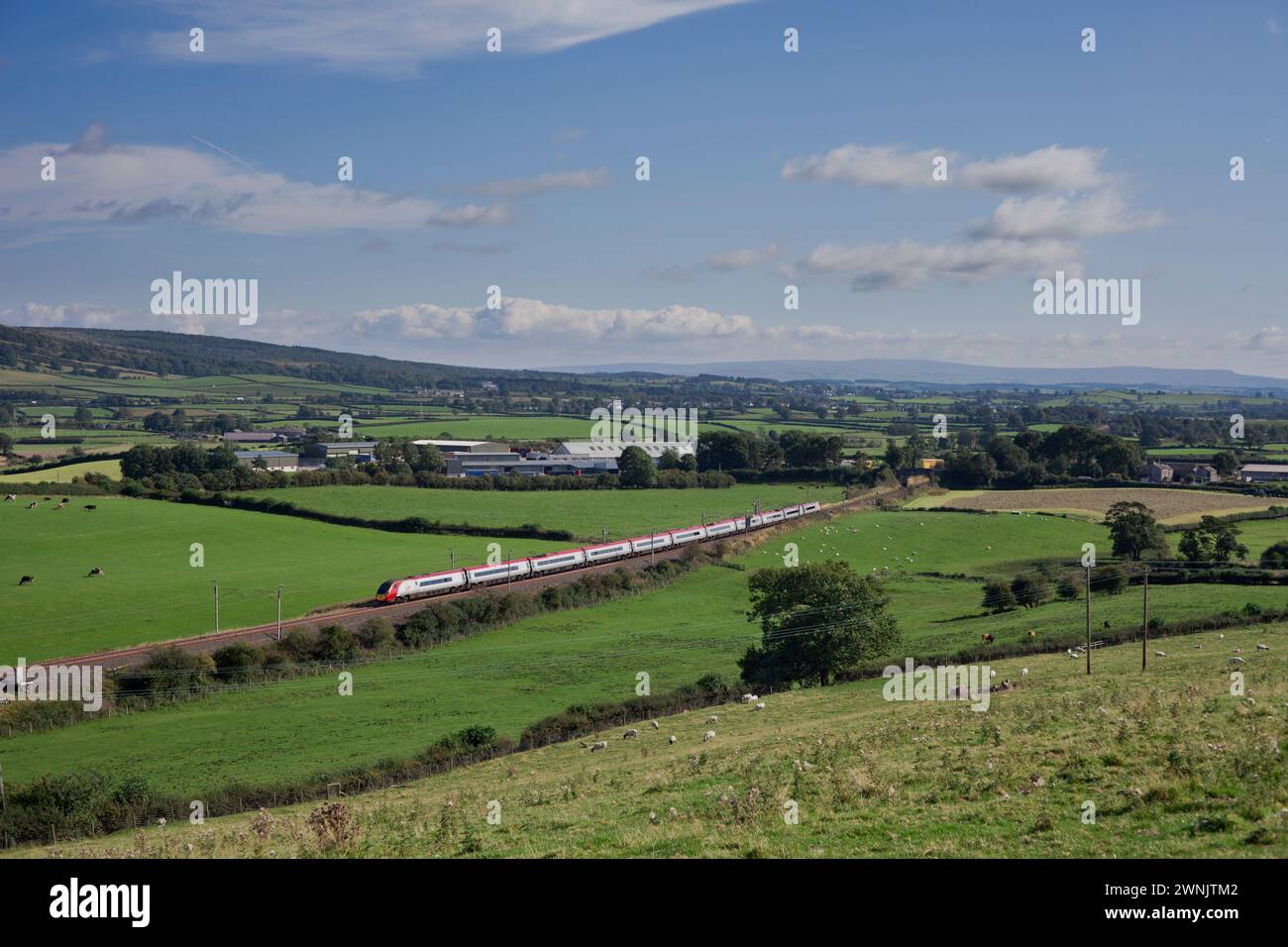 Virgin Trains Class 390 Pendolino Train In The Countryside On The West Coast Mainline In Cumbria 