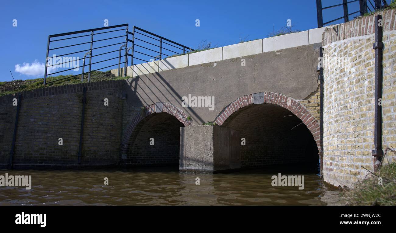 Old drainage sluice, recently restored Stock Photo - Alamy