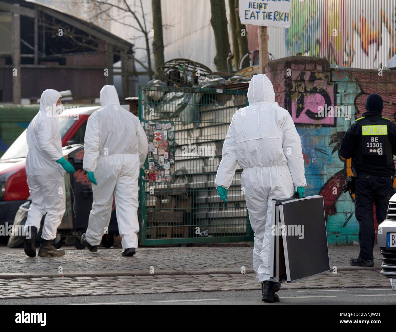 Berlin, Germany. 03rd Mar, 2024. Emergency services stand at a property ...