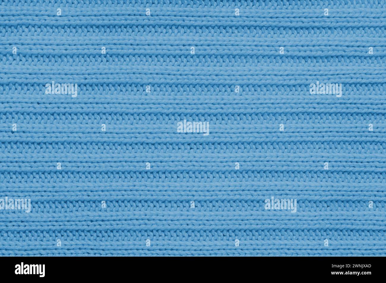Jersey textile background , blue striped knitted fabric. Woolen ...