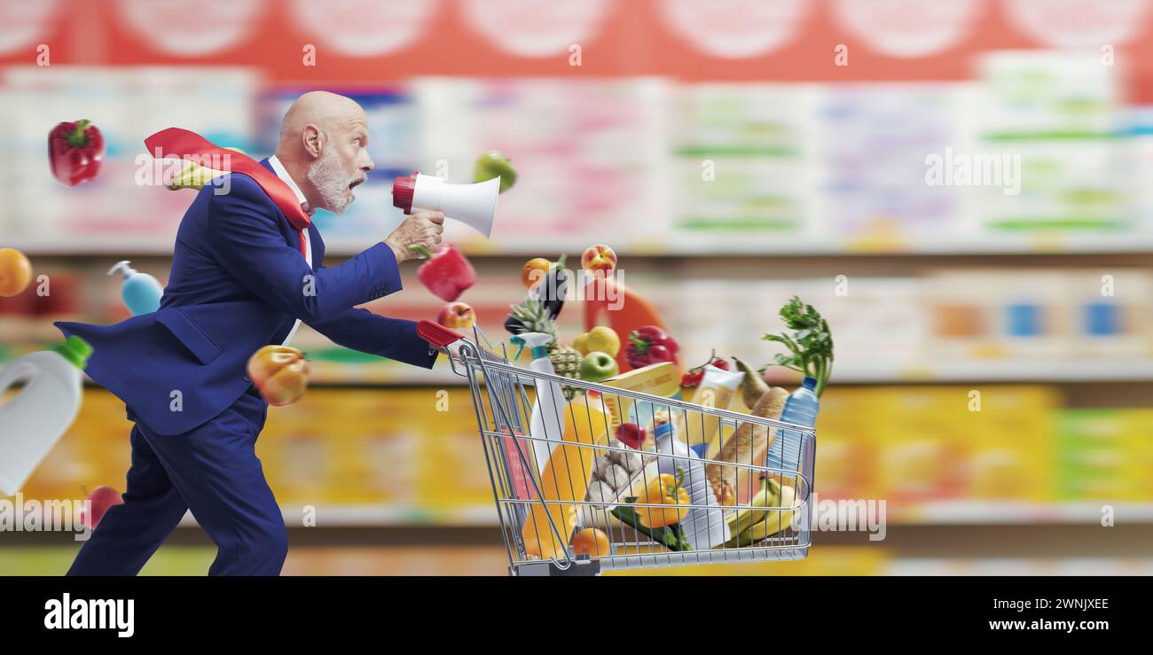 Fast corporate businessman pushing a supermarket shopping cart and ...