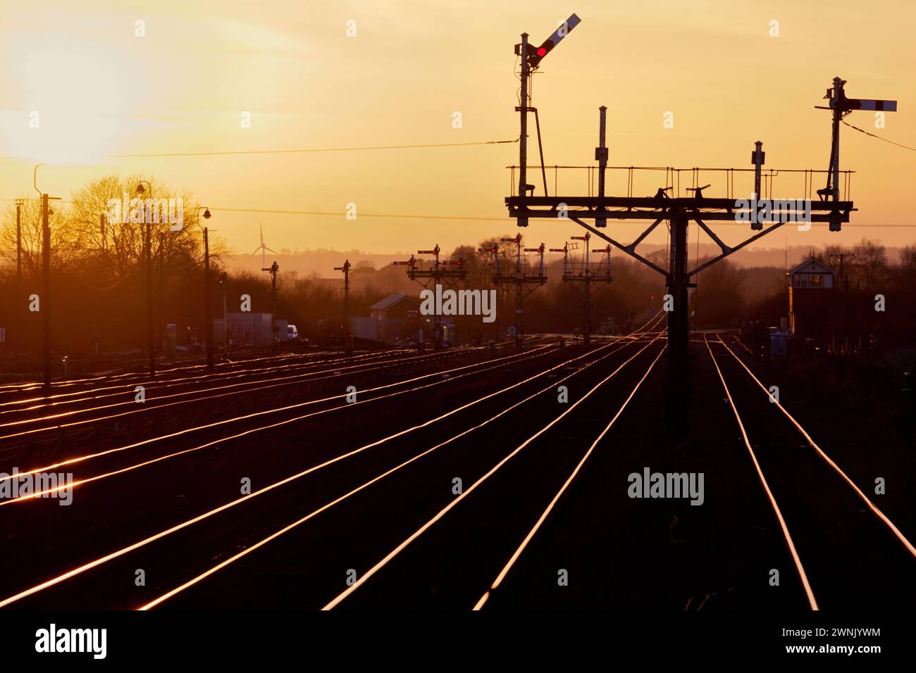 Railway upper quadrant semaphore signals with a golden sunset at ...