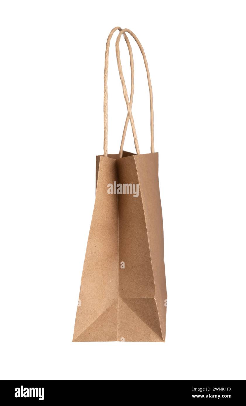 Kraft paper bag, side view, isolated on white background Stock Photo ...